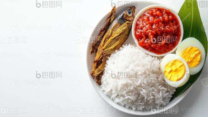 一盘米饭鸡蛋和一条鱼图片-包图网